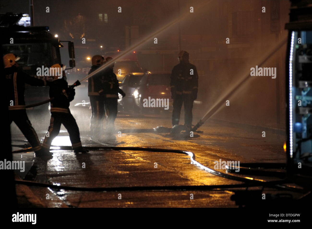 London, UK. 16th February 2014. 100 Firefighters tackle a warehouse ...