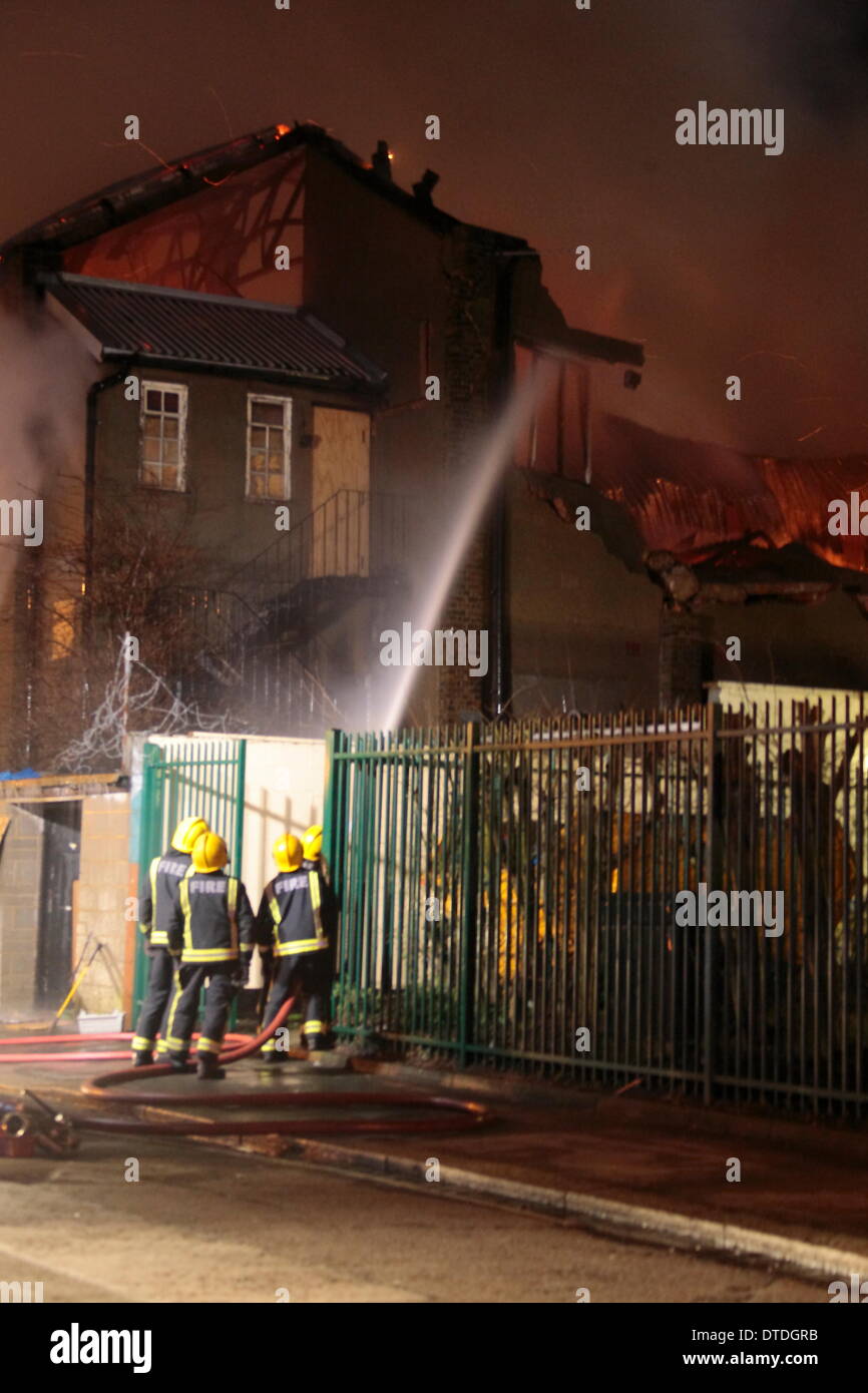 Firefighters scene fire in canning town hi-res stock photography and ...