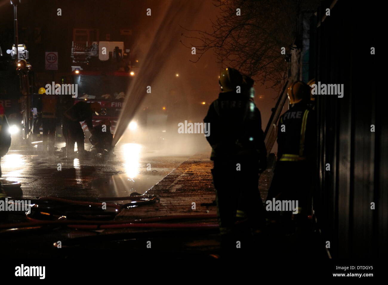 London, UK. 16th February 2014. 100 Firefighters tackle a warehouse ...