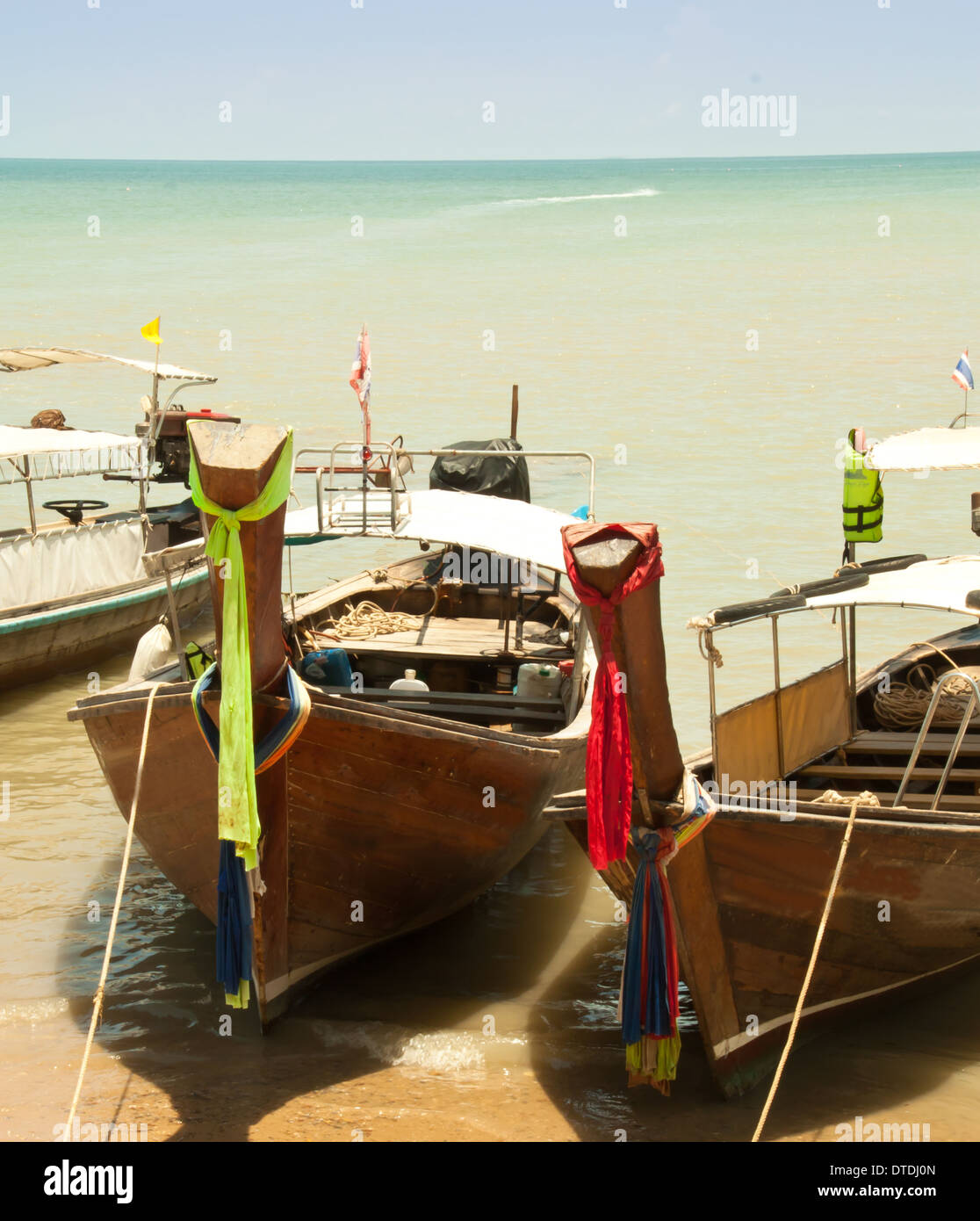 Local fishing boats. Moored in the harbor where the water is not deep ...
