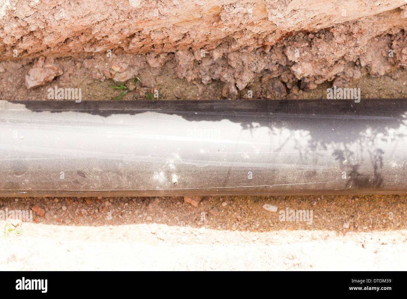 Pipes synthetic pipeline in the construction site Stock Photo - Alamy
