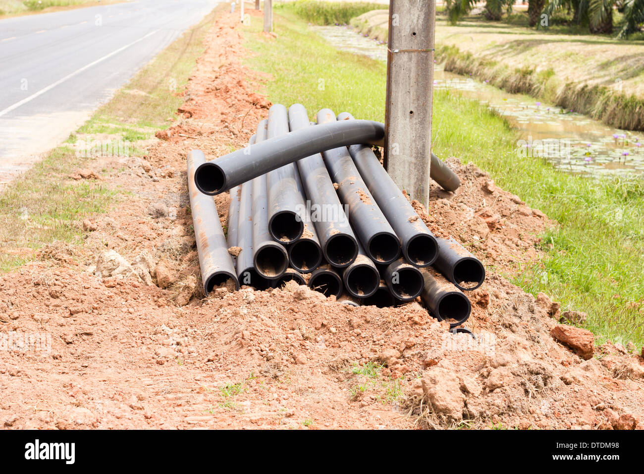 Pipes synthetic pipeline in the construction site Stock Photo - Alamy