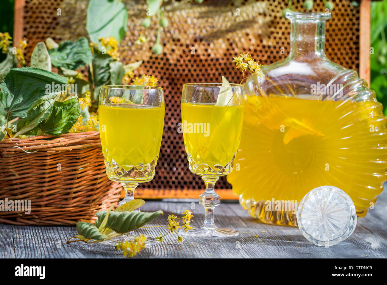 Homemade liqueur made of honey and lime Stock Photo - Alamy