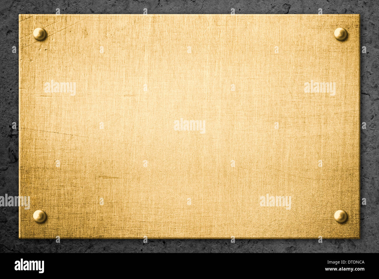 golden metal plate or signboard on wall background Stock Photo - Alamy