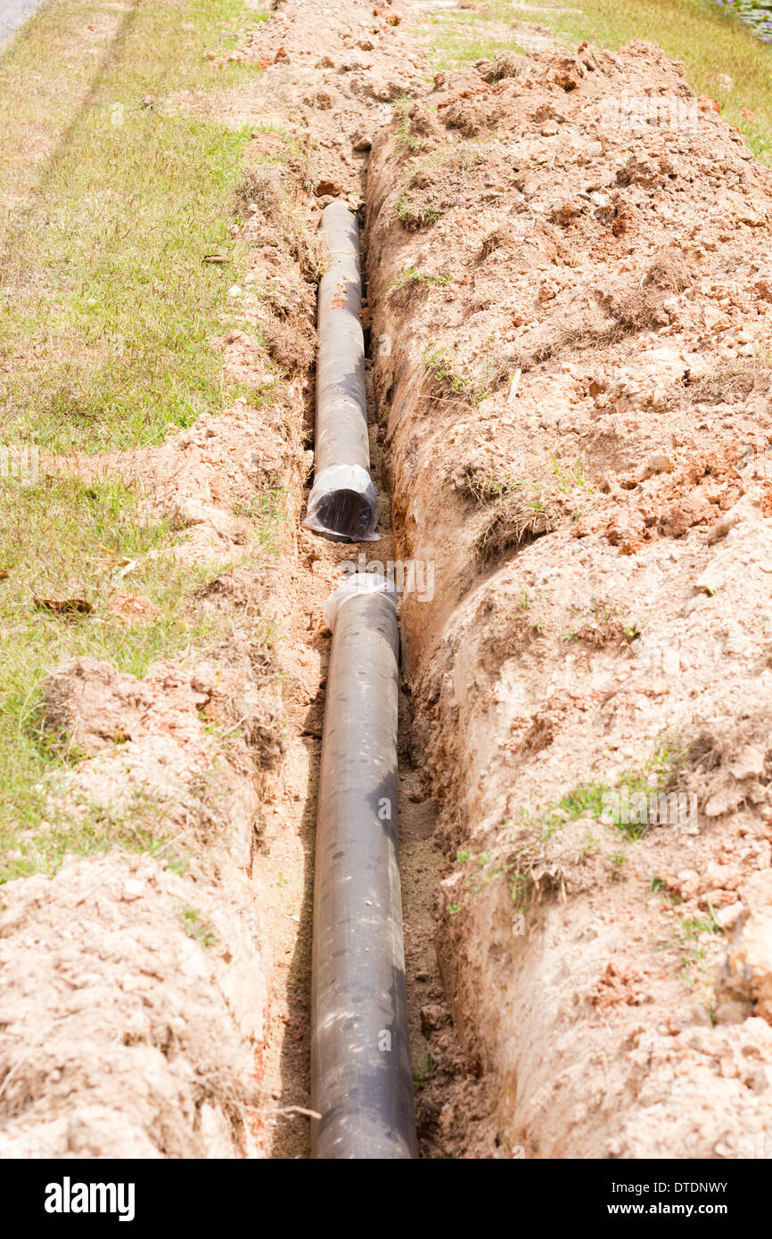 Pipes synthetic pipeline in the construction site Stock Photo - Alamy