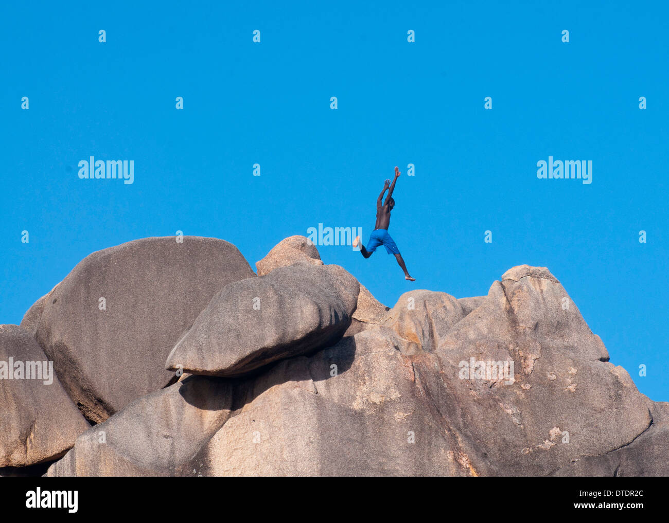Man jumping joy mountain hi-res stock photography and images - Alamy