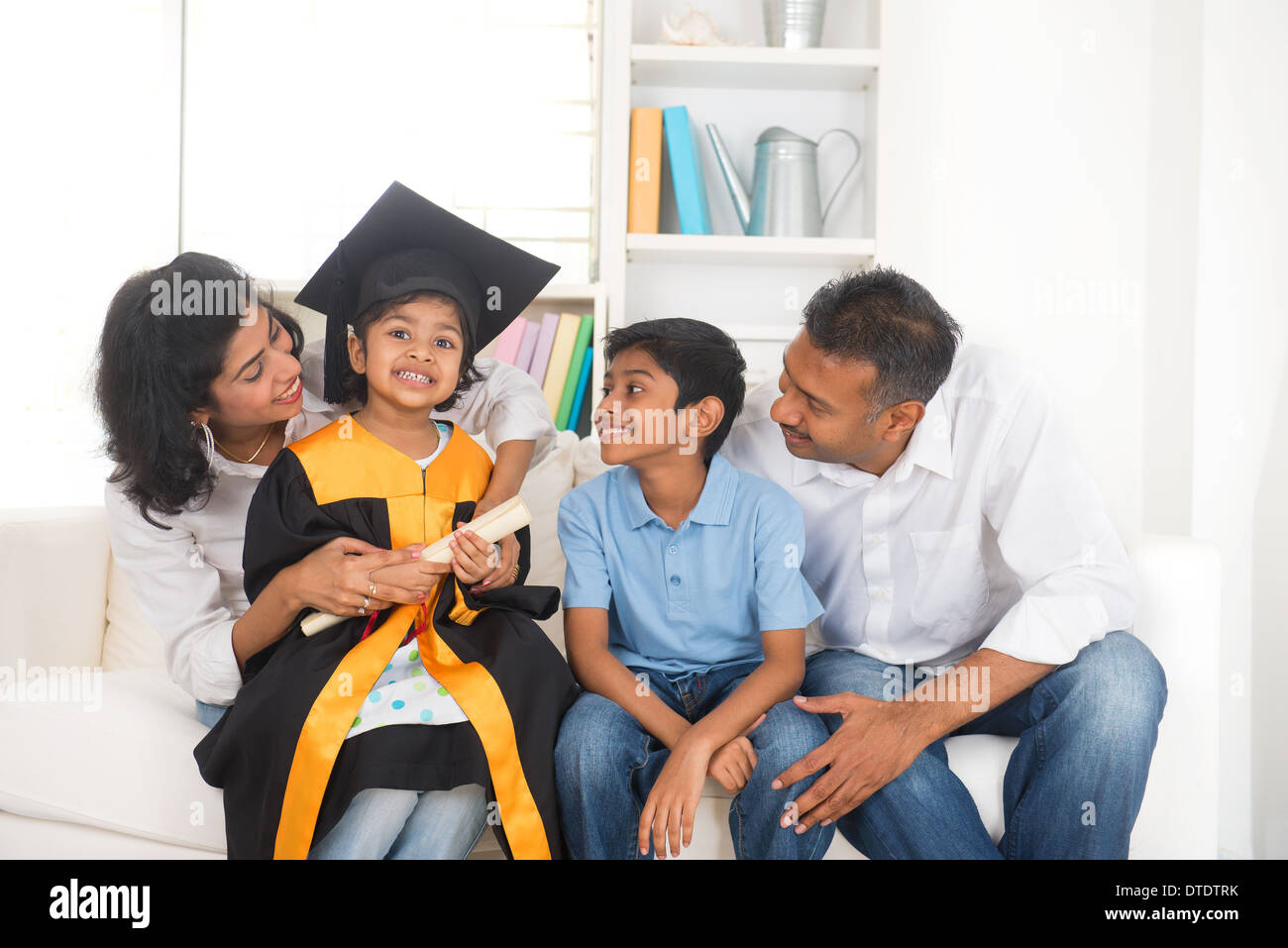 Happy indian family graduation, education concept photo Stock Photo - Alamy