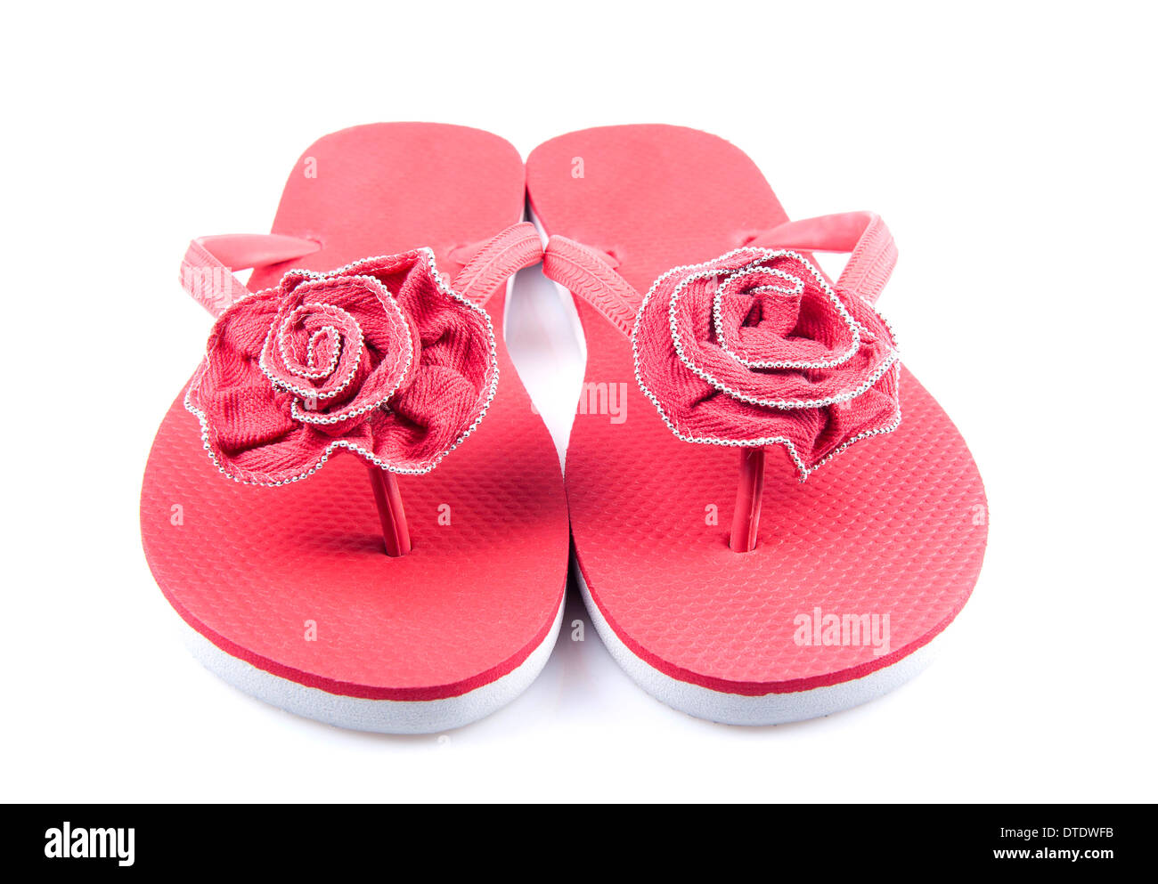Red flip flops on a white background Stock Photo - Alamy