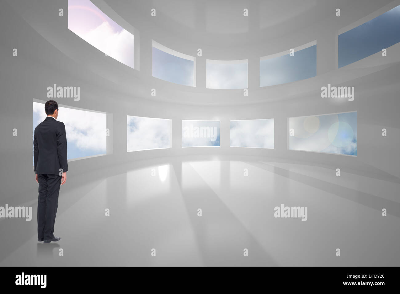 Composite image of businessman turning his back to camera Stock Photo ...