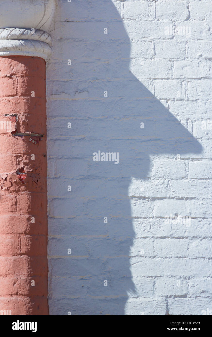 Unusual column shadow as human face silhouette Stock Photo - Alamy