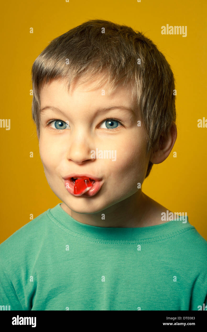 Boy eating sweets candy hi-res stock photography and images - Alamy