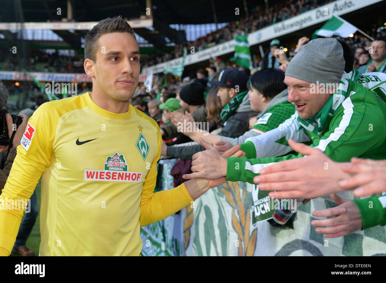 Bremen, Germany. 15th Feb, 2014. Bremen's goalkeeper Raphael Wolf high ...