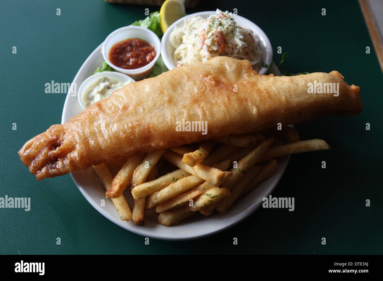 Fish & Chips with a pint of stout beer Stock Photo - Alamy