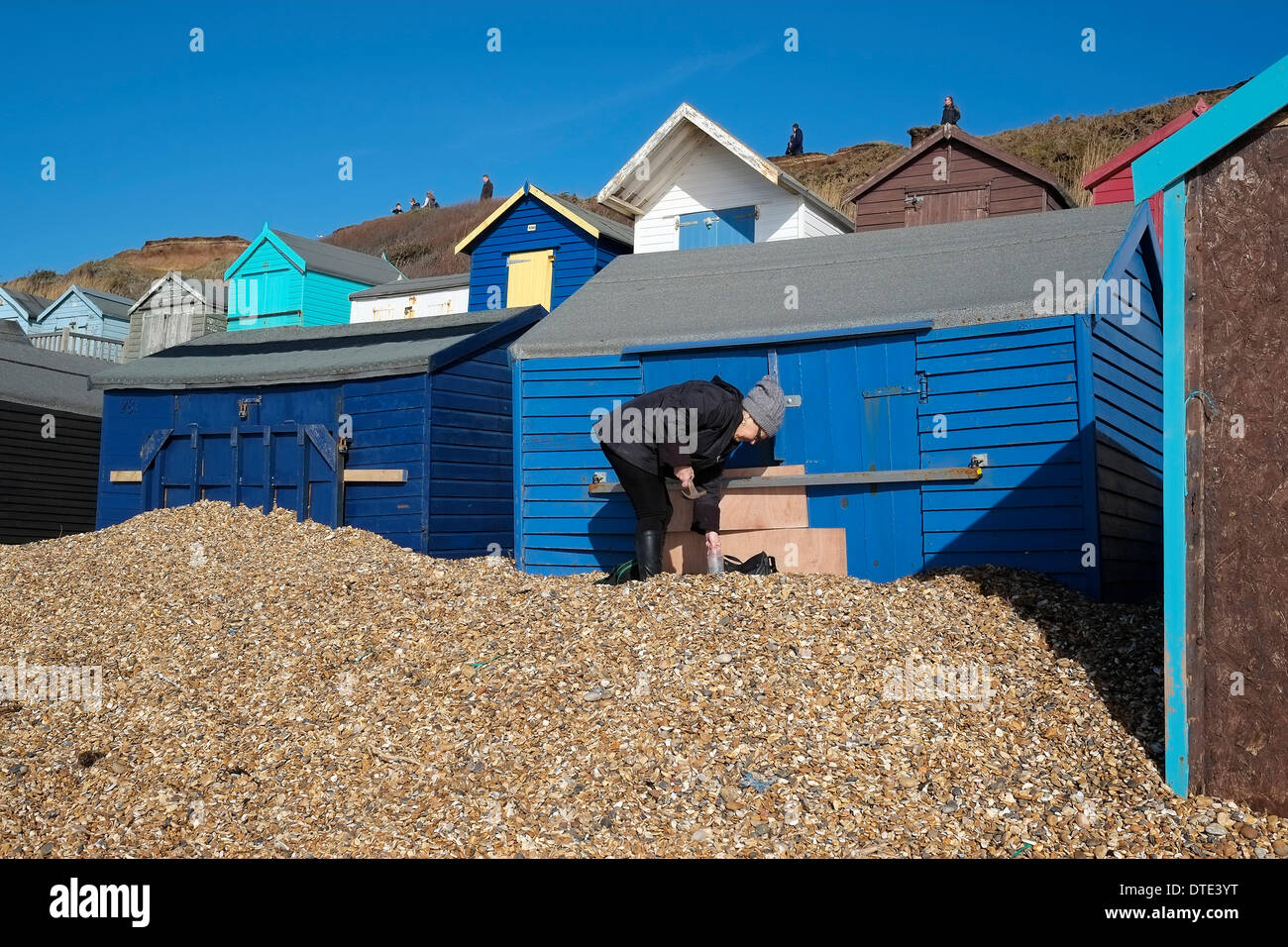 Beach shingle, blown up by the storm on the 14-2-14, comes half way up ...