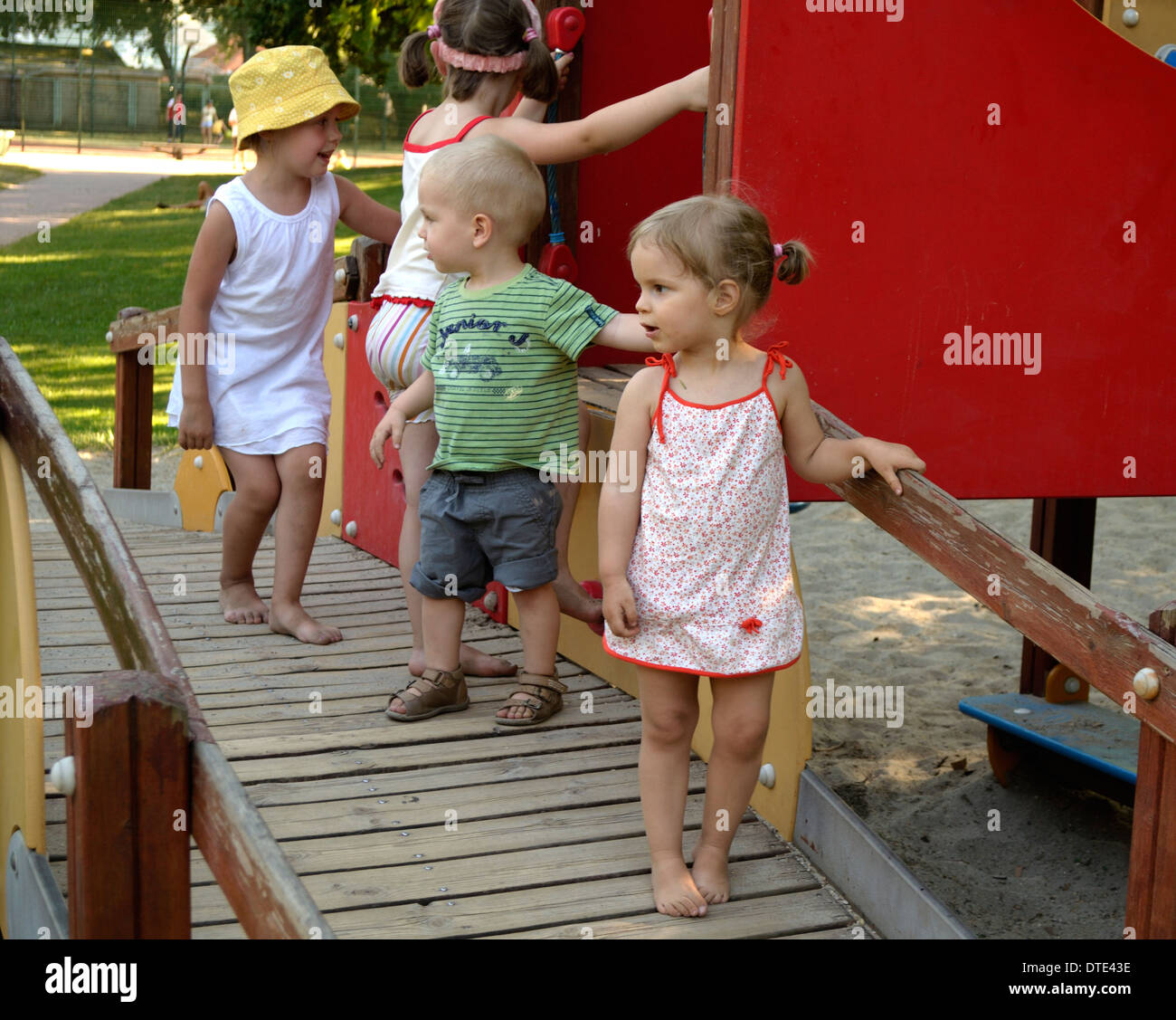 Little kids on the playground Stock Photo - Alamy