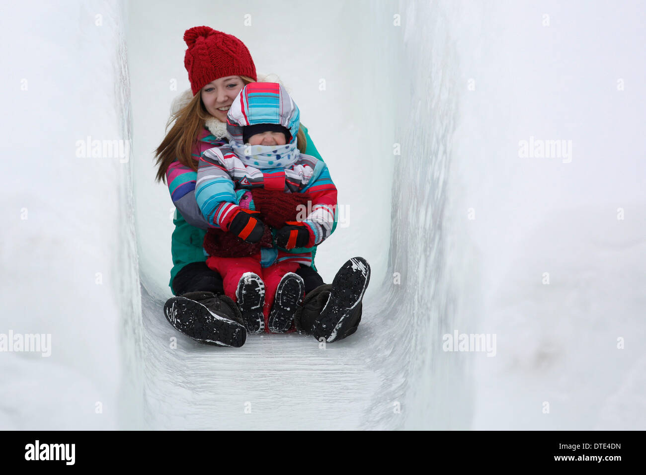 Quebec, Canada. 15th Feb, 2014. Two visitors enjoy snow-sliding at the ...