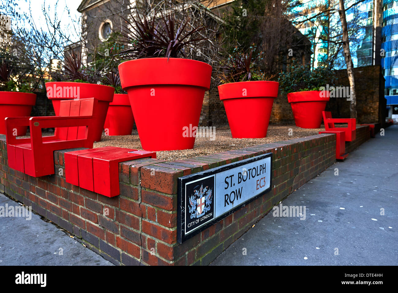Giant Red Pot Plants near the Gherkin Stock Photo - Alamy