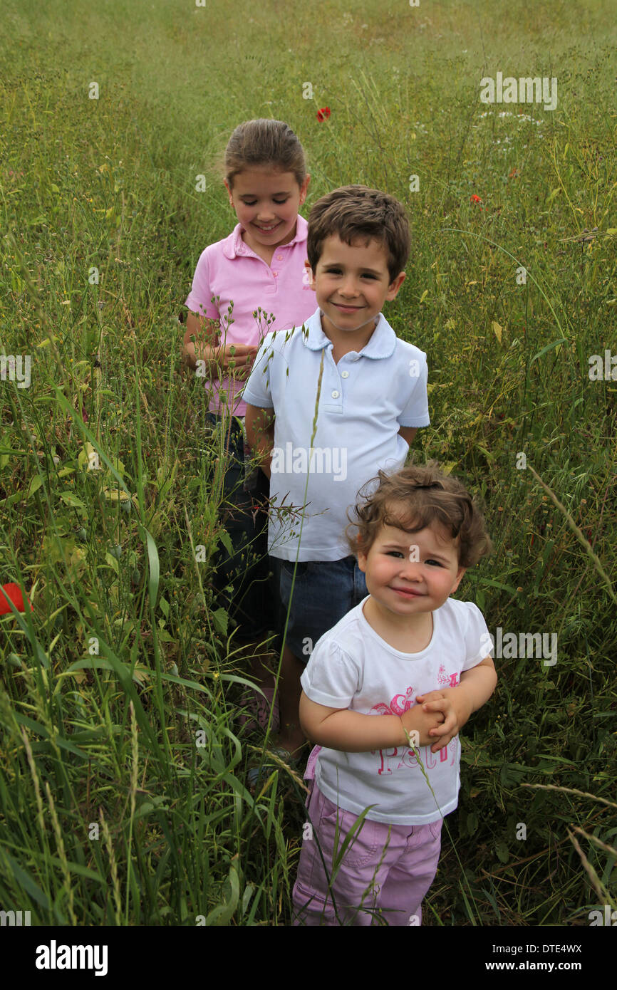 Happy young family three on country walk hi-res stock photography and ...