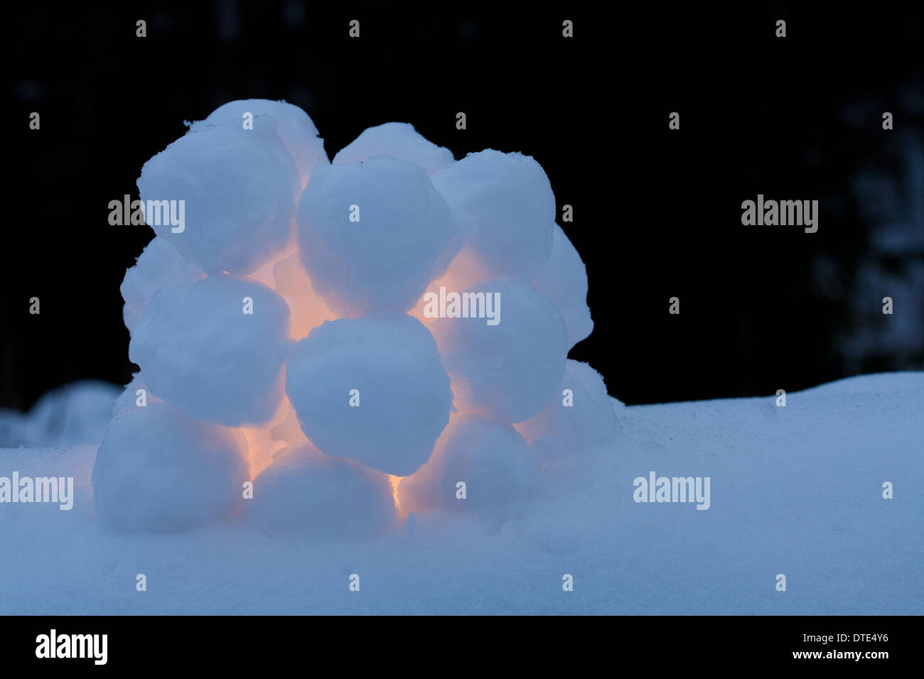 snowball lantern - small dome made of snowballs, lit candle inside ...