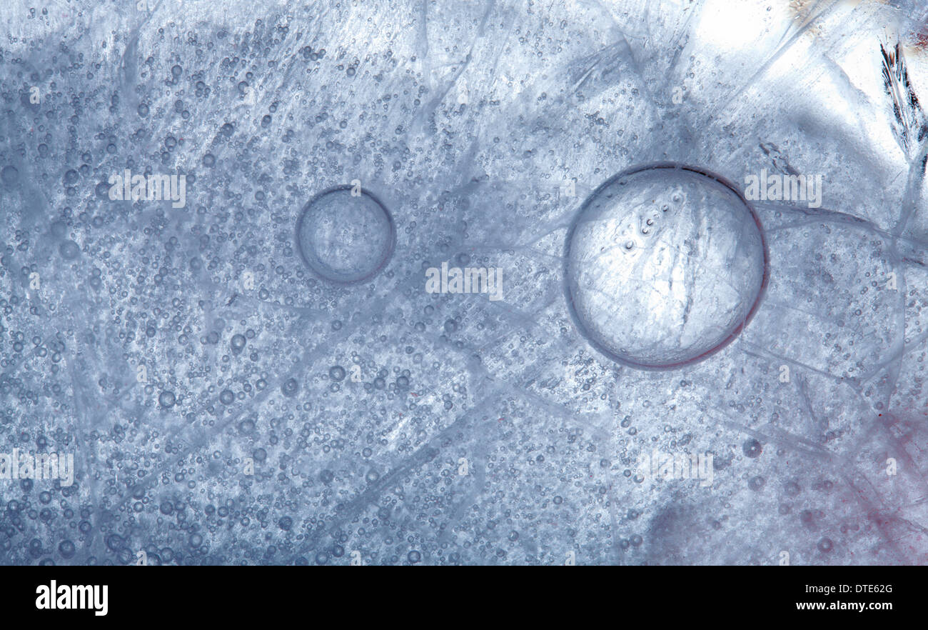 ice with trapped air bubbles natural ackground Stock Photo - Alamy