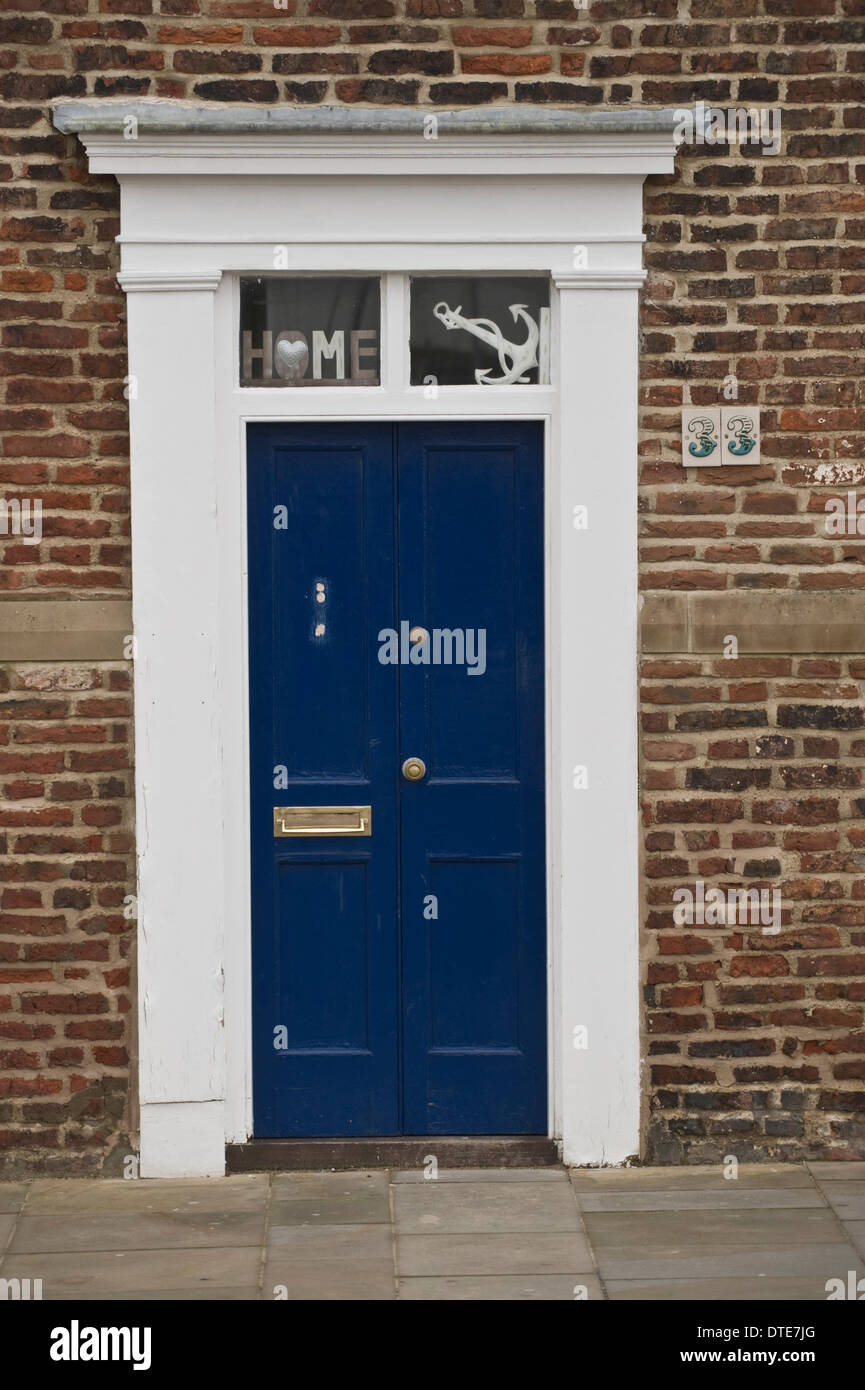 Blue number 33 wooden front door of house in Scarborough North ...