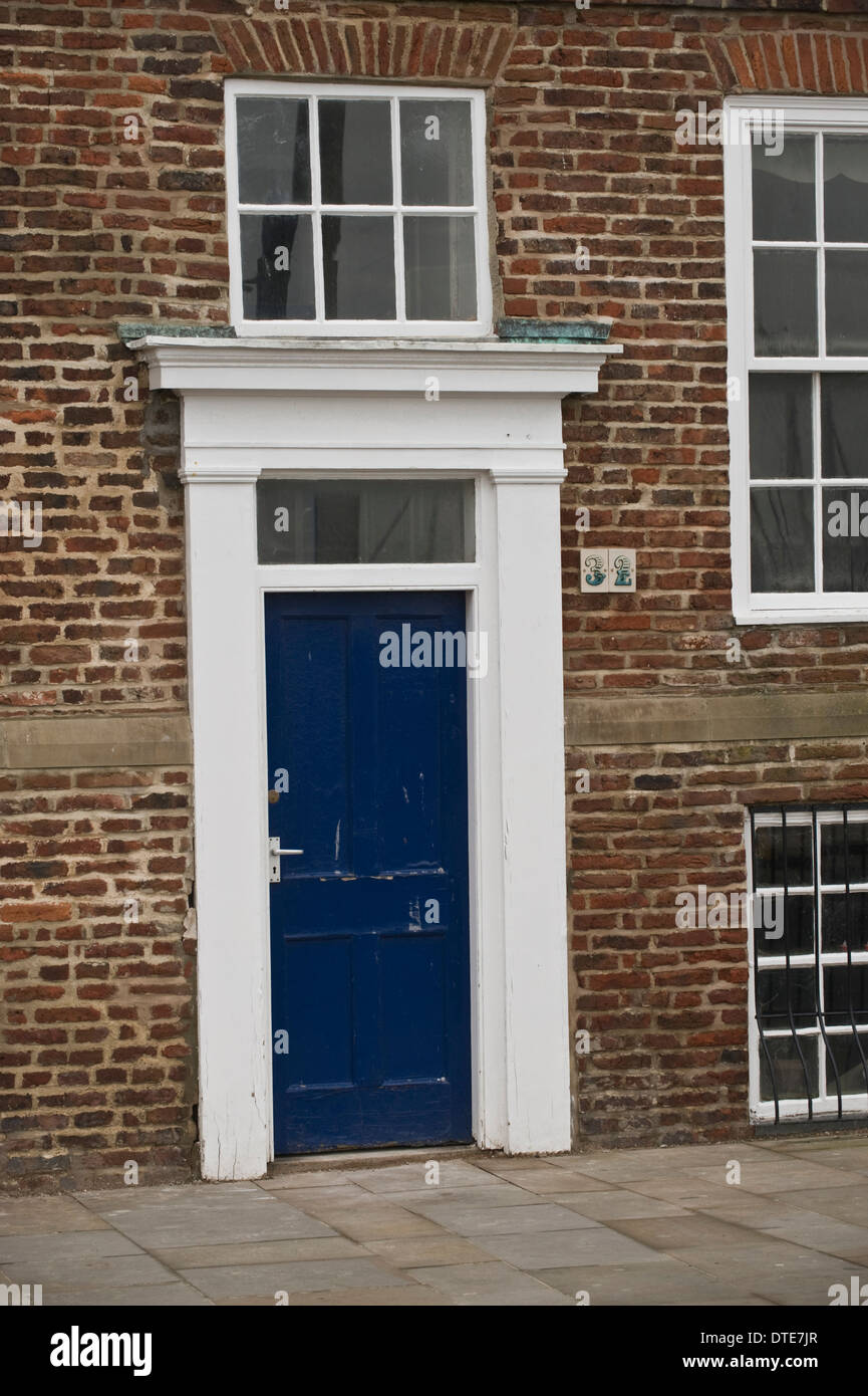 Blue number 32 wooden front door of house in Scarborough North ...