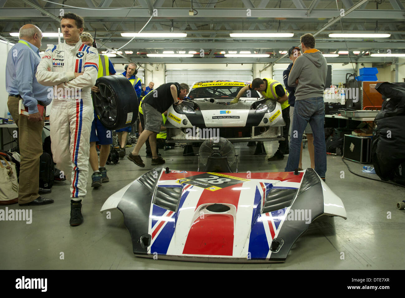 Team LNT mechanics work to repair their team's Ginetta G55 GT3 car as ...