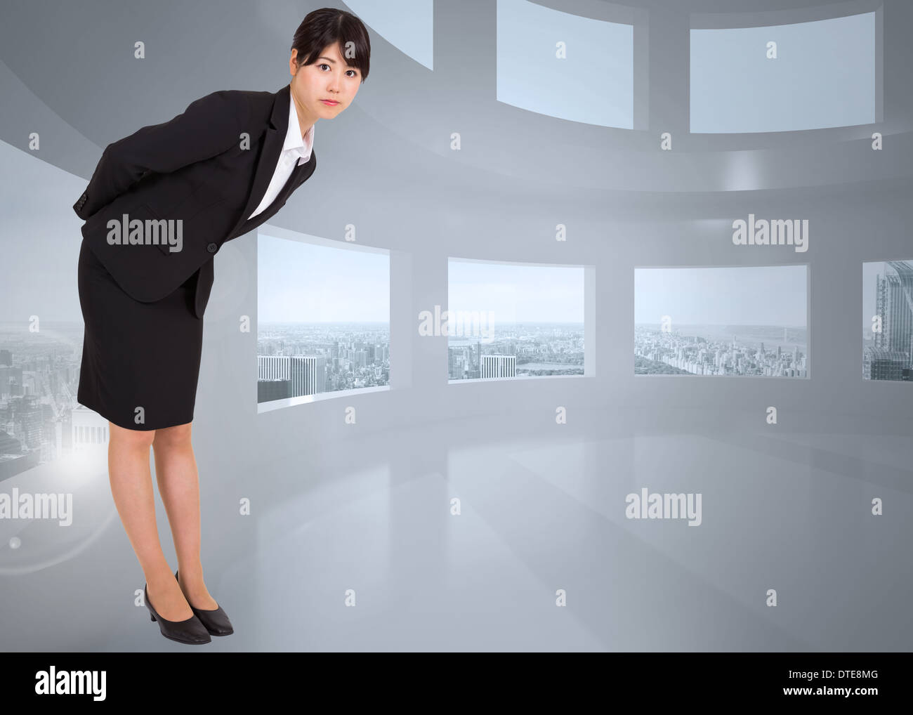 Composite image of serious businesswoman bending Stock Photo - Alamy