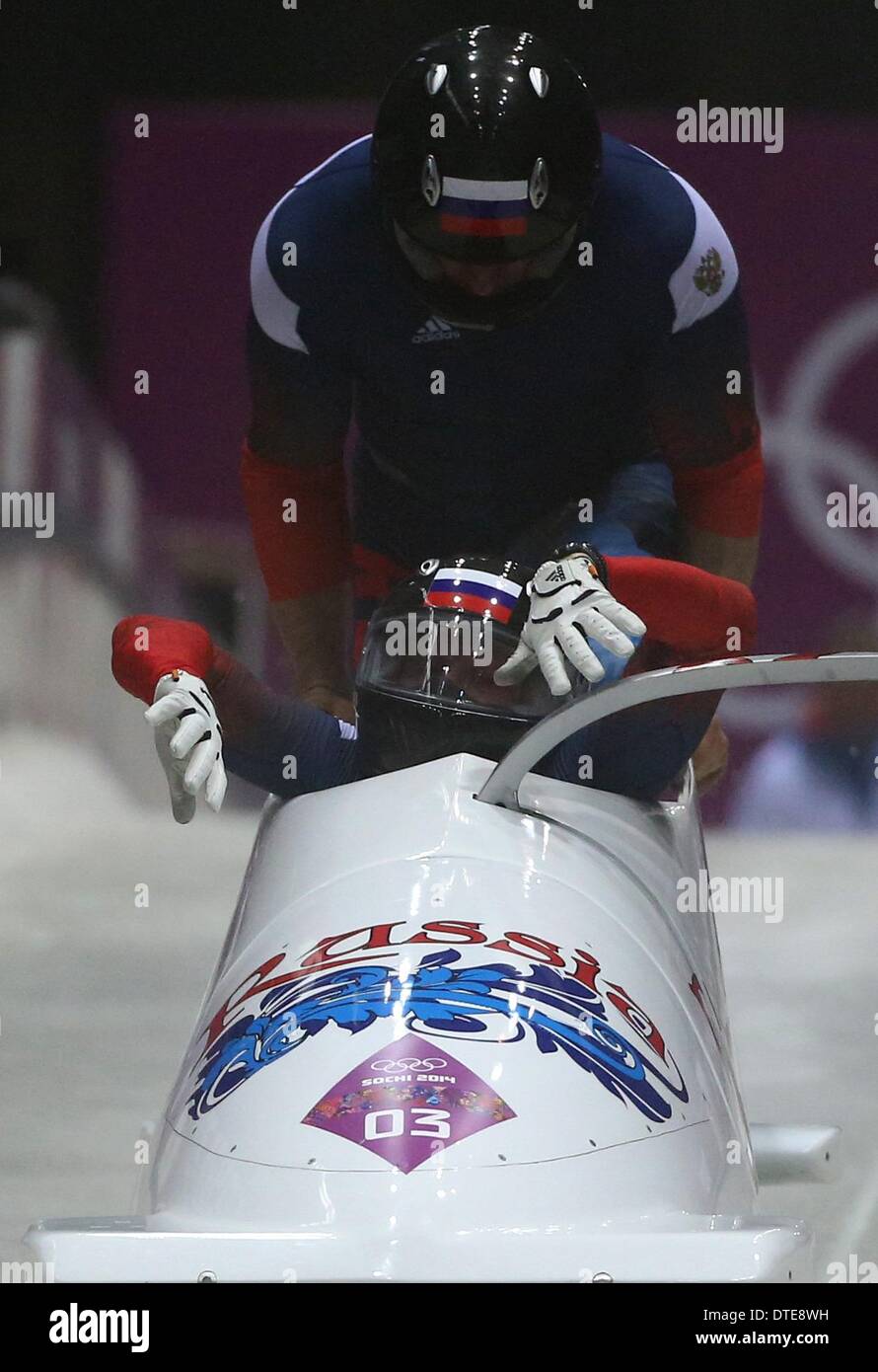 Pilot Alexander Zubkov and Alexey Voevoda of Russia 1 compete in the ...