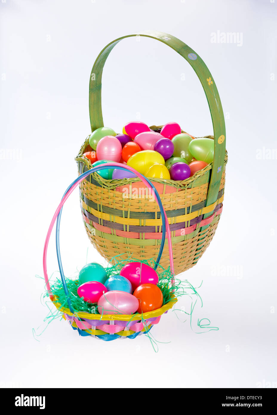 Two Easter Baskets with eggs and grass in them Stock Photo - Alamy
