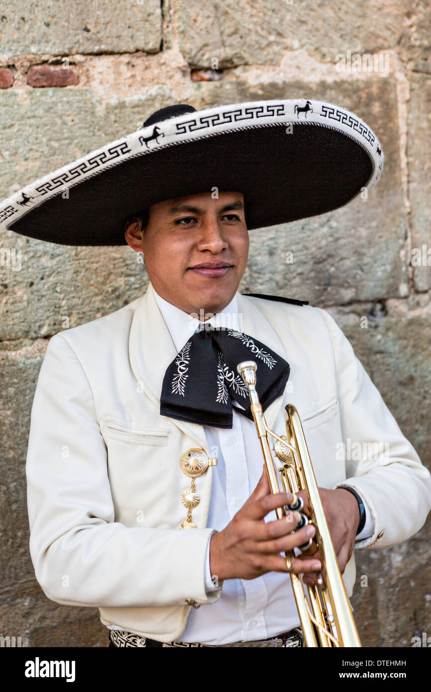 A mariachi band member dressed in traditional charro costume November 5 ...