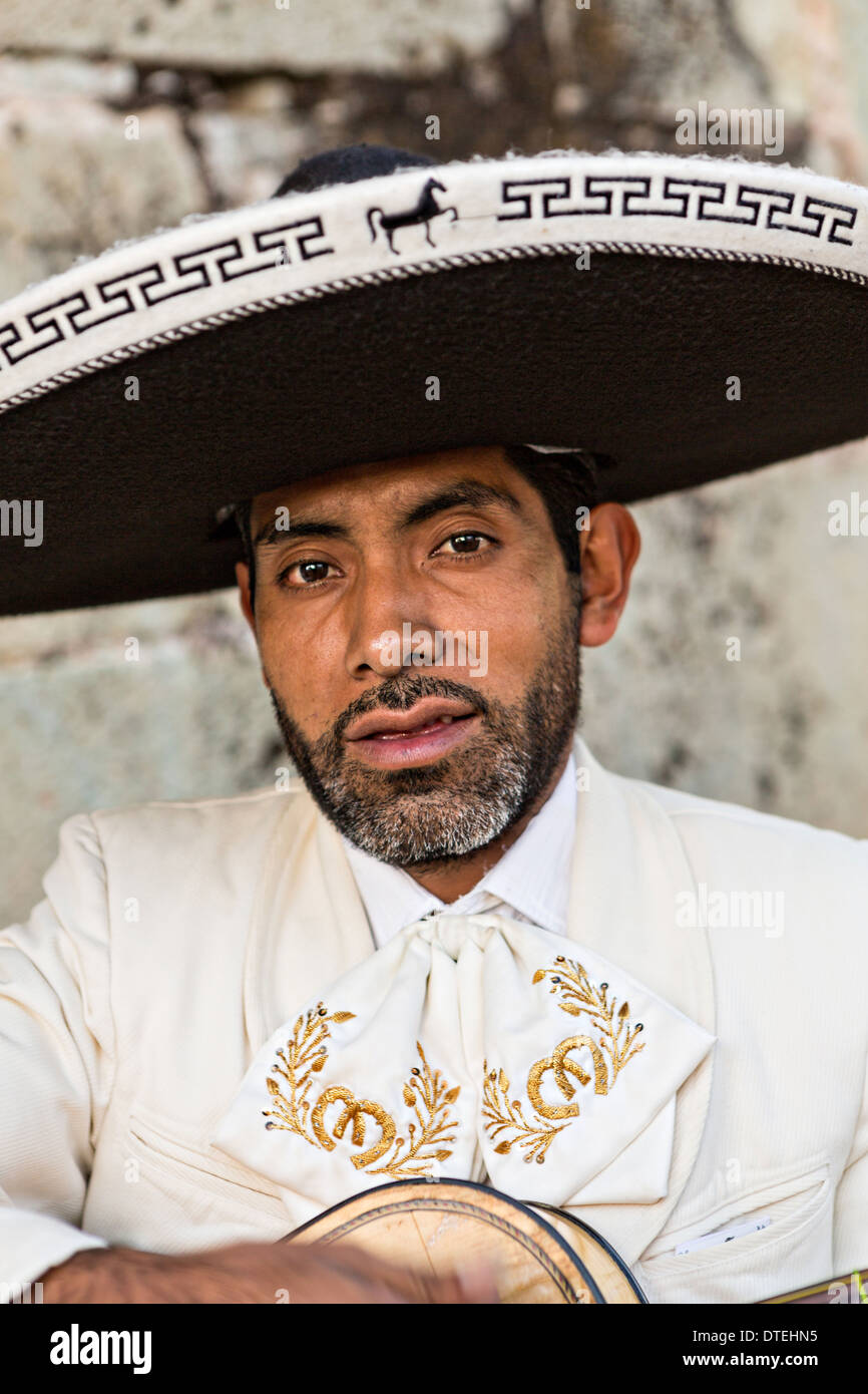 A mariachi band member dressed in traditional charro costume November 5 ...