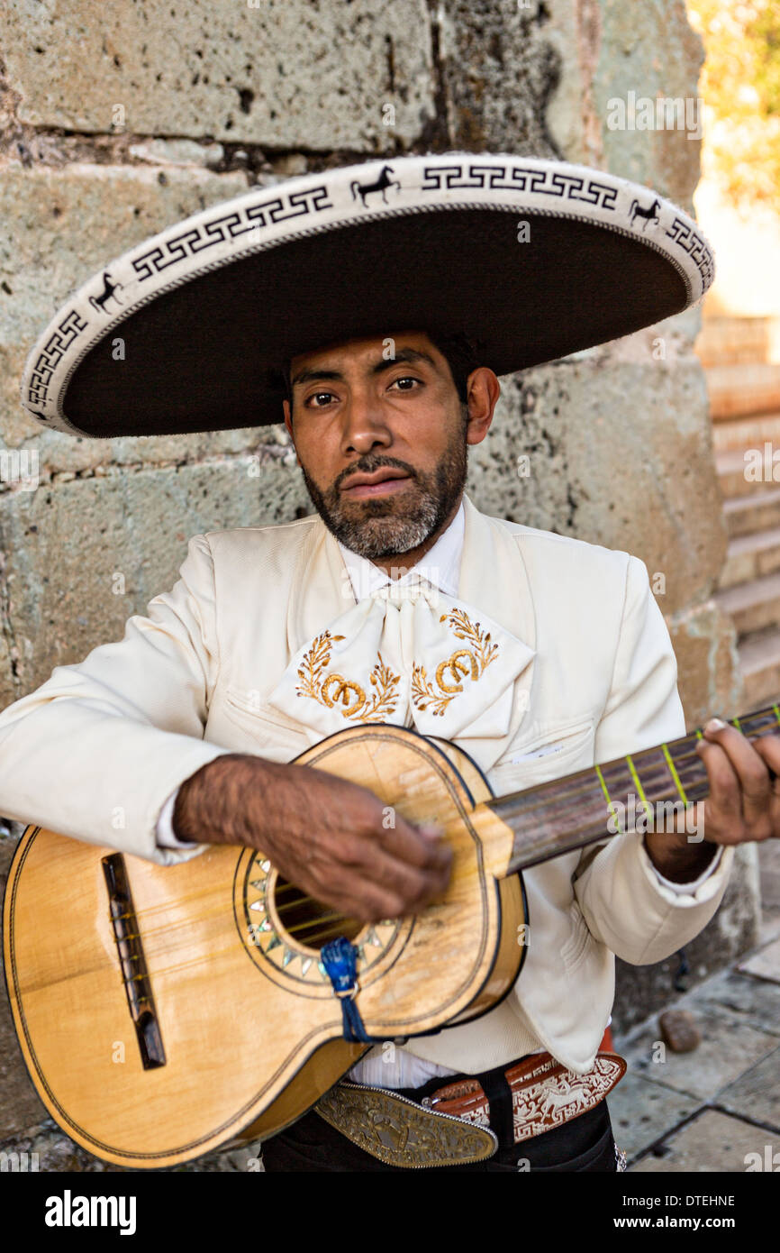 A mariachi band member dressed in traditional charro costume November 5 ...