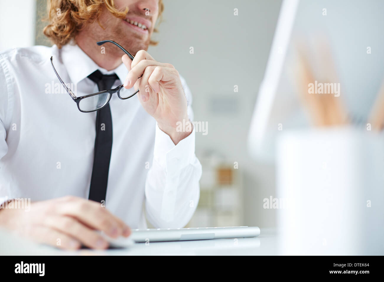 Businessman looking interest computer hi-res stock photography and ...