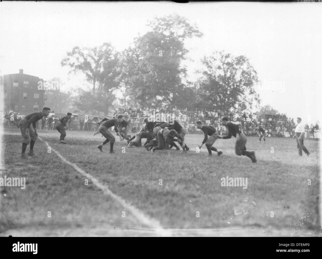 A photograph capturing the action at the 1913 Miami-Georgetown football ...