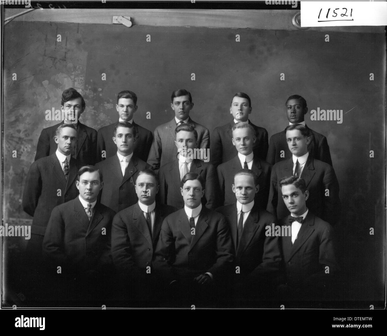 A group portrait of men taken in 1912, representing a snapshot of the ...