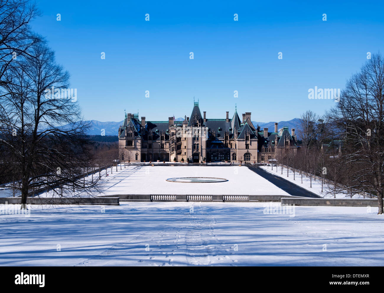 The Biltmore Mansion, front View, with snow on the ground and mountains ...