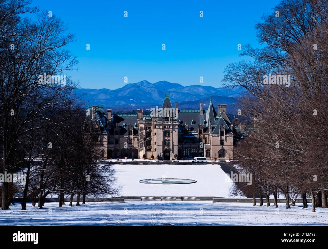 The Biltmore Mansion, front View, with snow on the ground and mountains ...