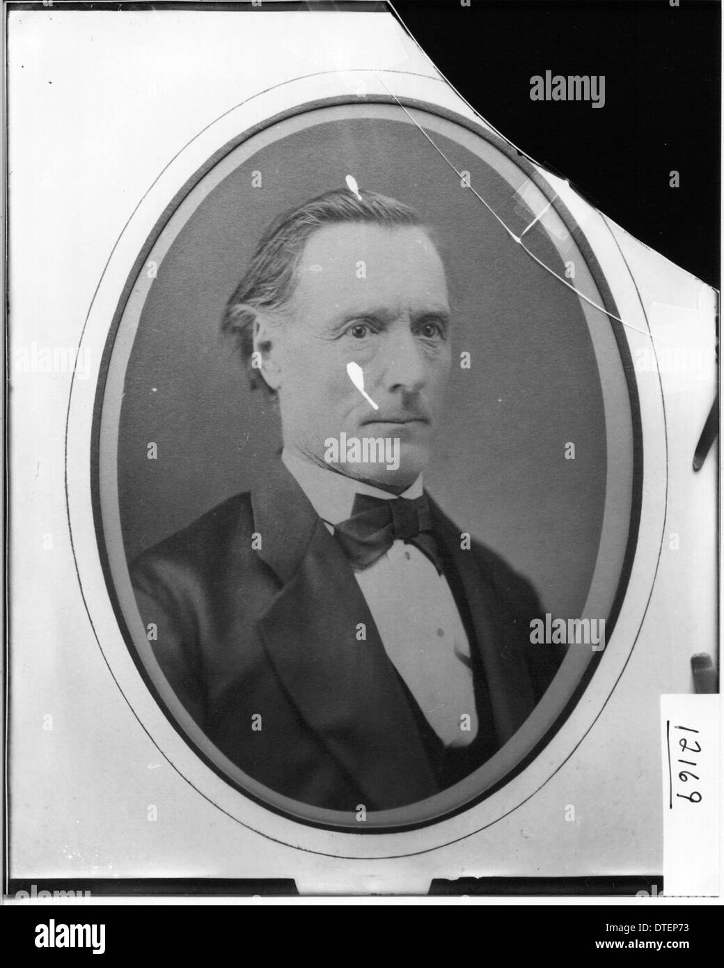 This 1912 portrait photograph features an unidentified man, providing a ...