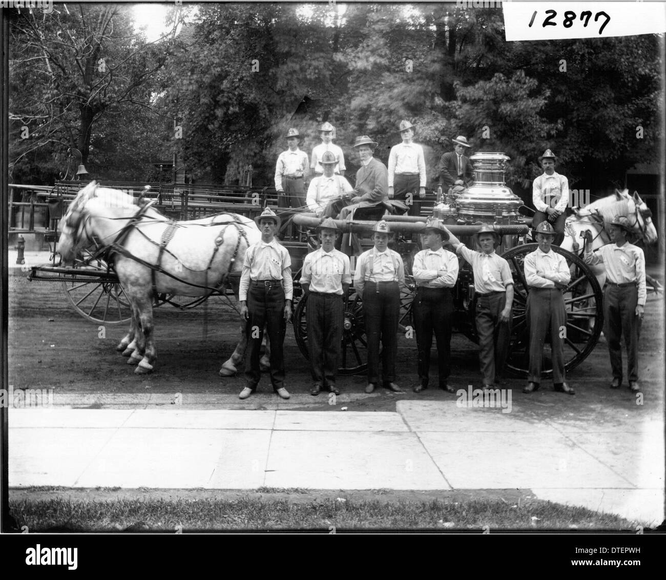 A 1912 photograph shows the Oxford Fire Department, including fire ...