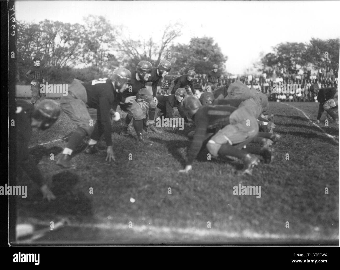 A dynamic photograph from the 1922 Miami-Akron football game, showing ...