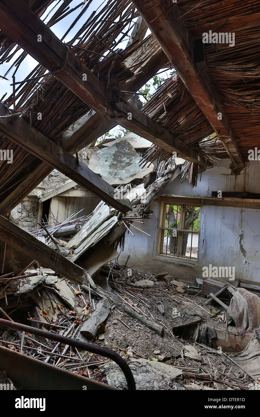 Collapsed roof in an abandoned derelict house in an old village in Bulgaria Stock Photo - Alamy