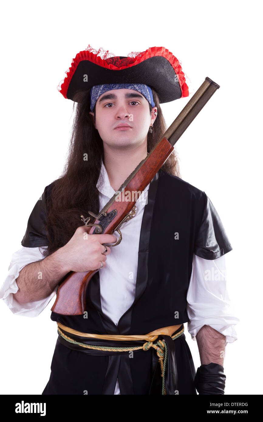 Dangerous pirate with a vintage gun in hands isolated on white ...