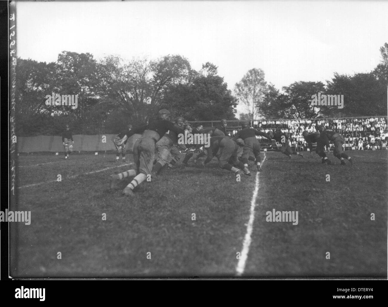 A dynamic moment from the 1922 Varsity-Alumni football game at Miami ...
