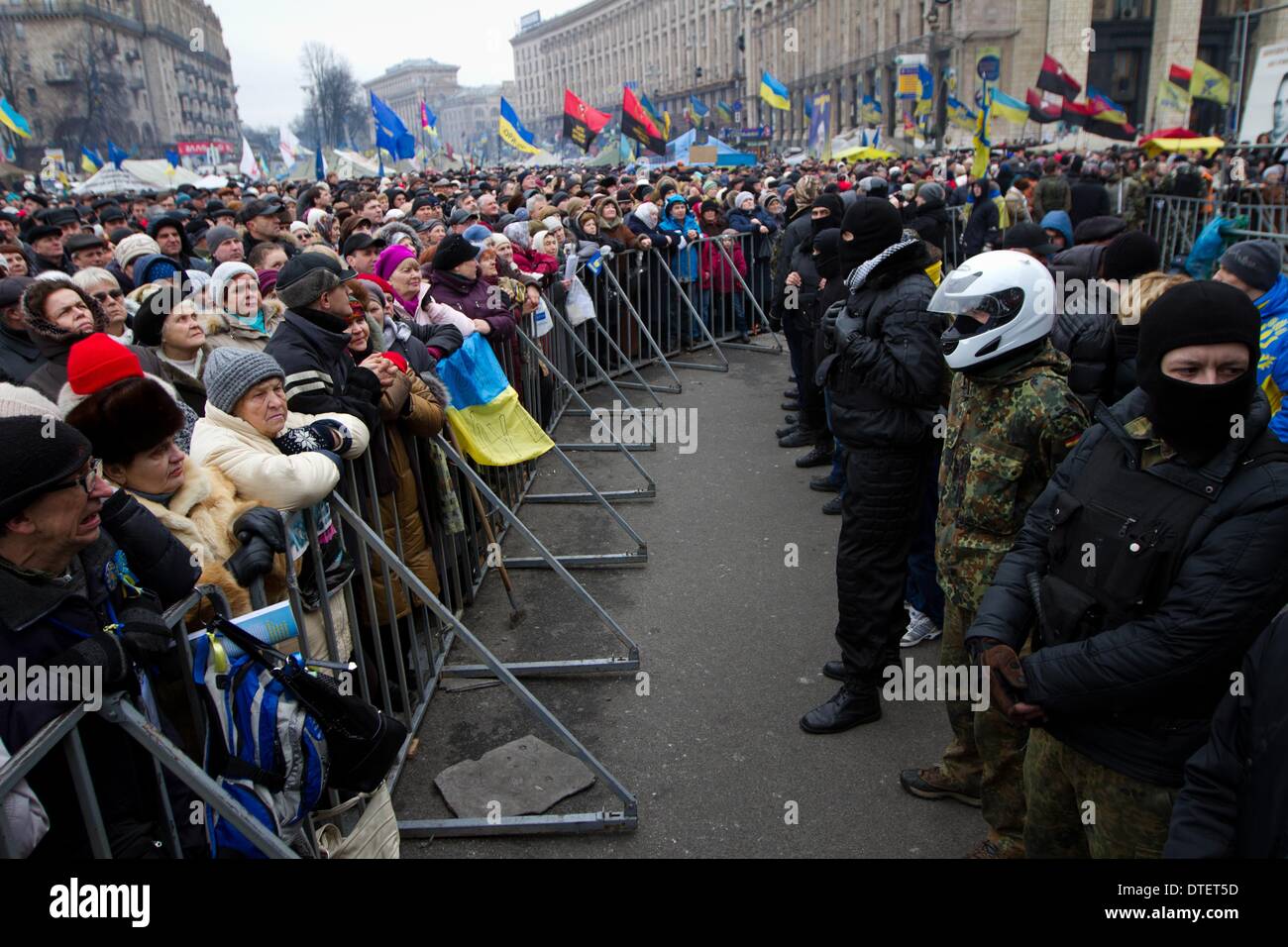 Kiev, Ukraine. 16th Feb, 2014. Guards surround a scene during a mass ...