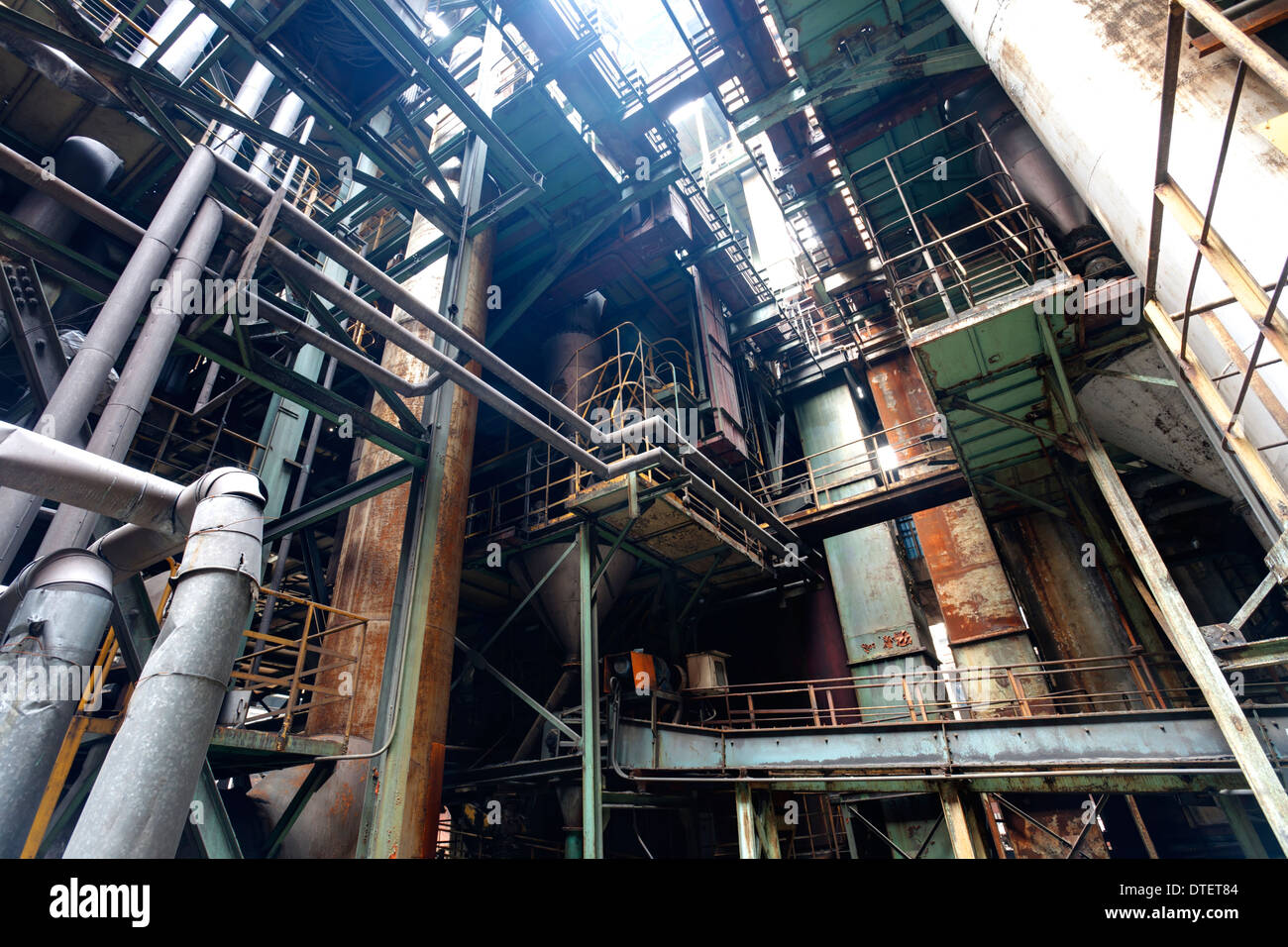 Interior of steel mill with pipes and valves Stock Photo - Alamy