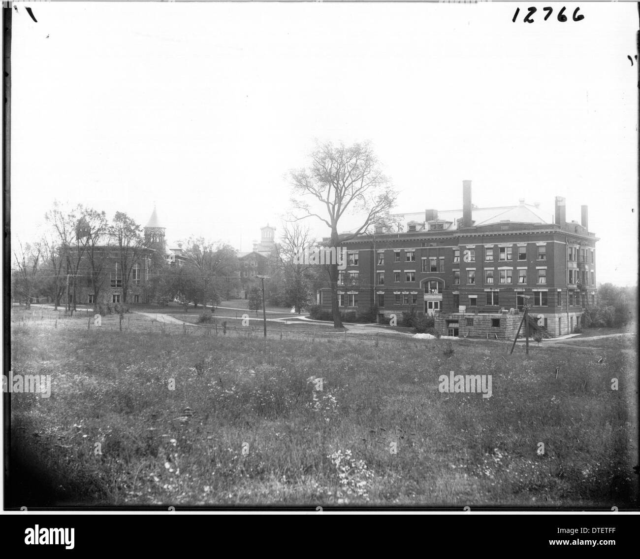 This photograph captures Western College buildings and a new building ...