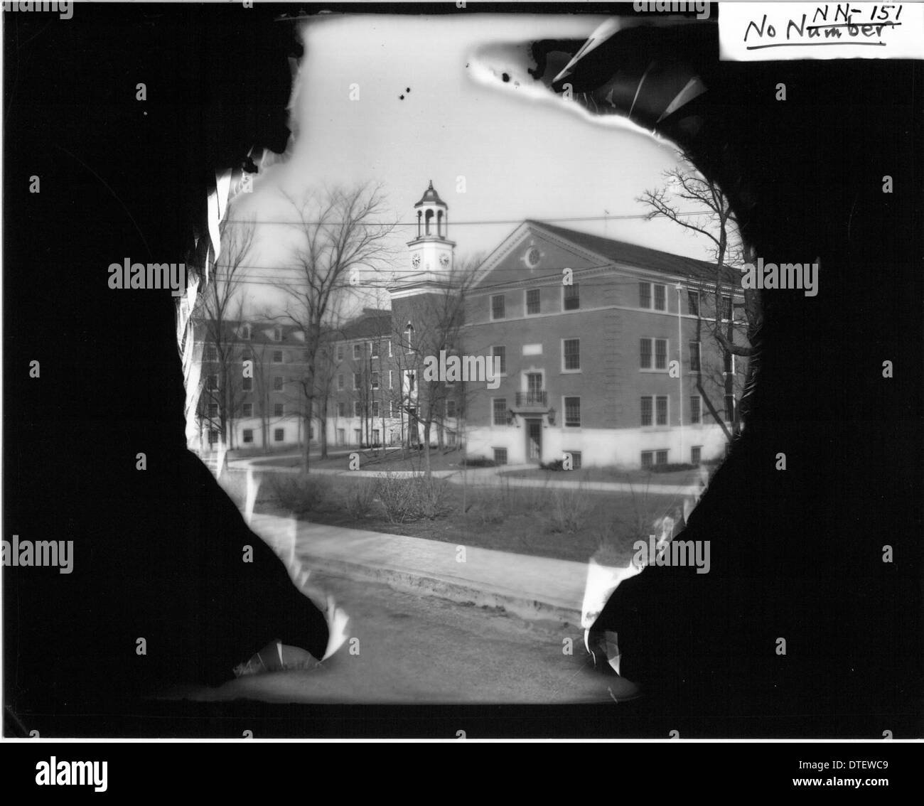 A historic photograph of Swing Hall's main entrance and clock tower at ...