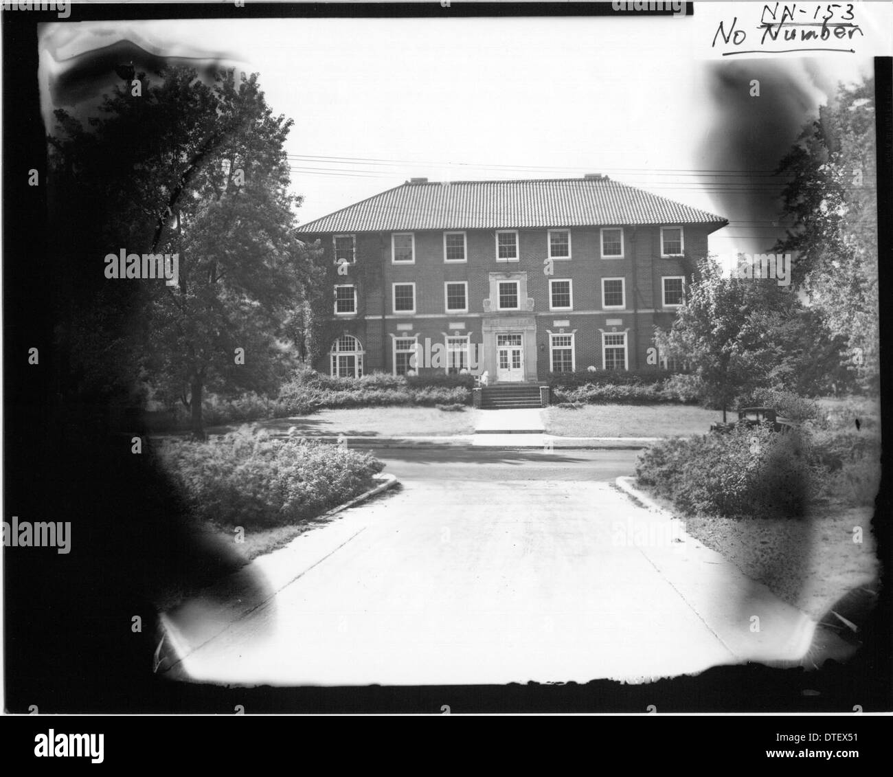 This photograph shows the front entrance of Wells Hall at Miami ...