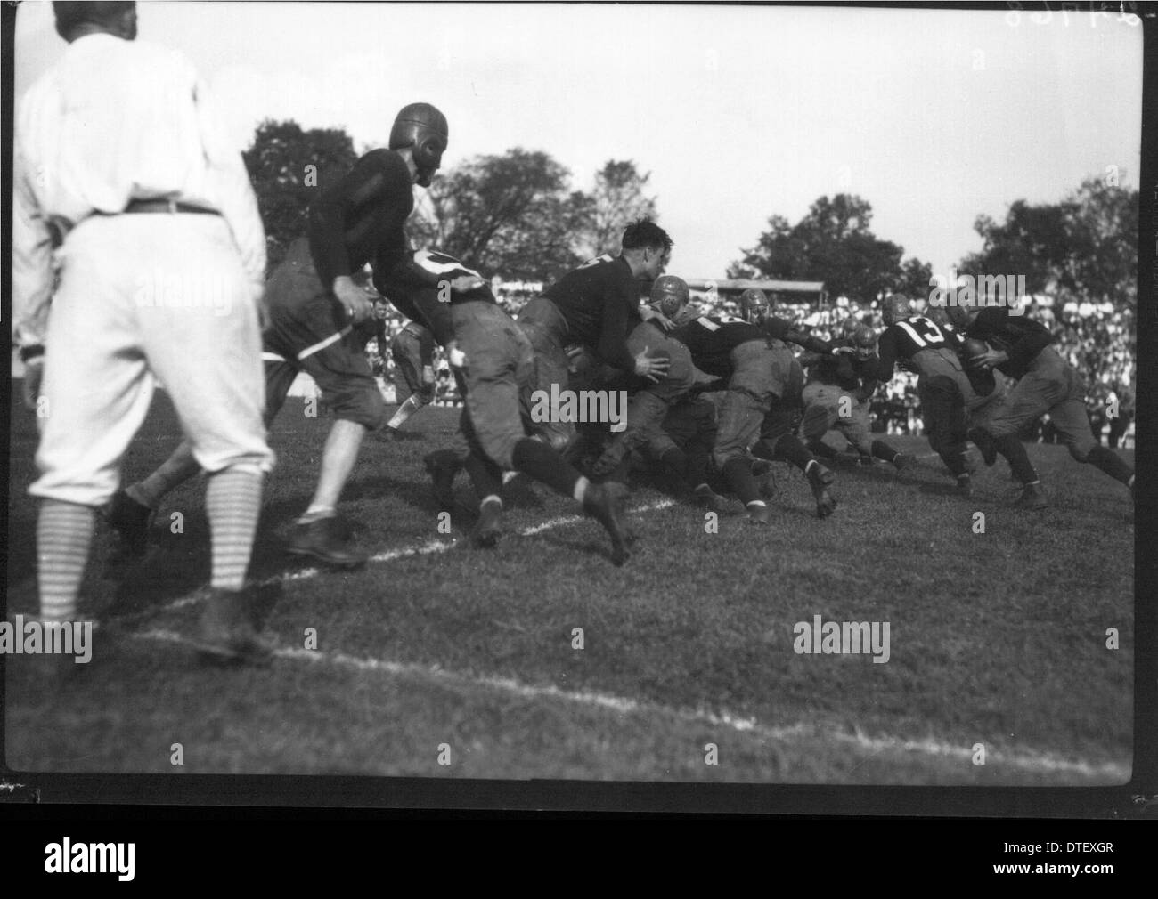 A photograph capturing the action at the 1926 Miami University vs. Ohio ...